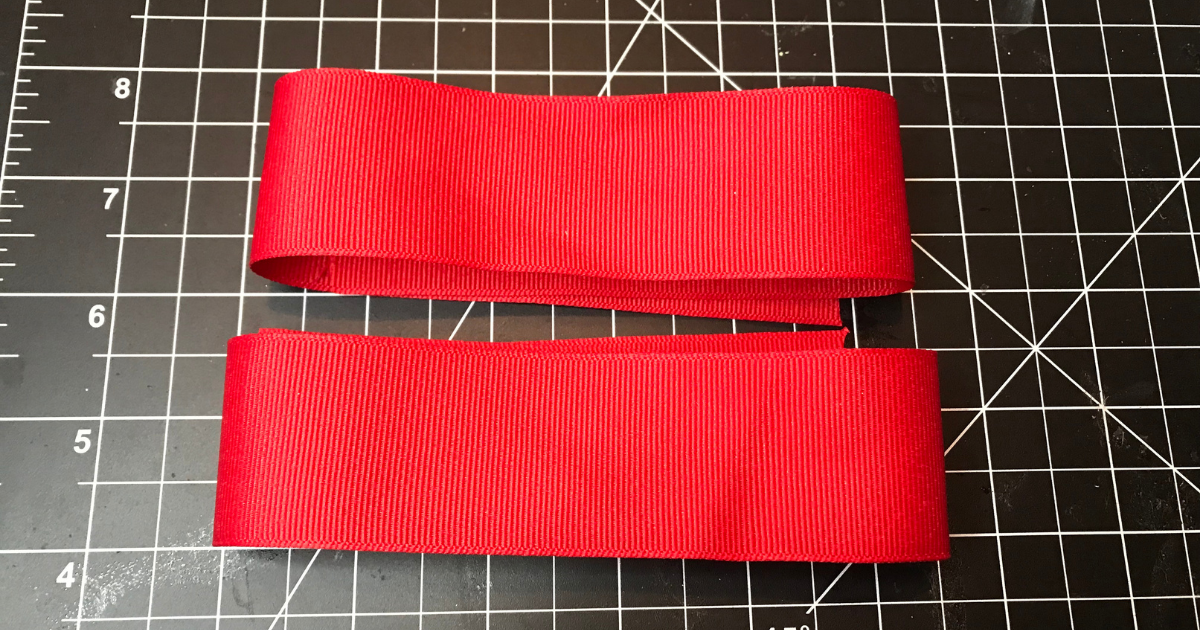 Lay out the grosgrain ribbon to 5 inches and then fold it again and ...